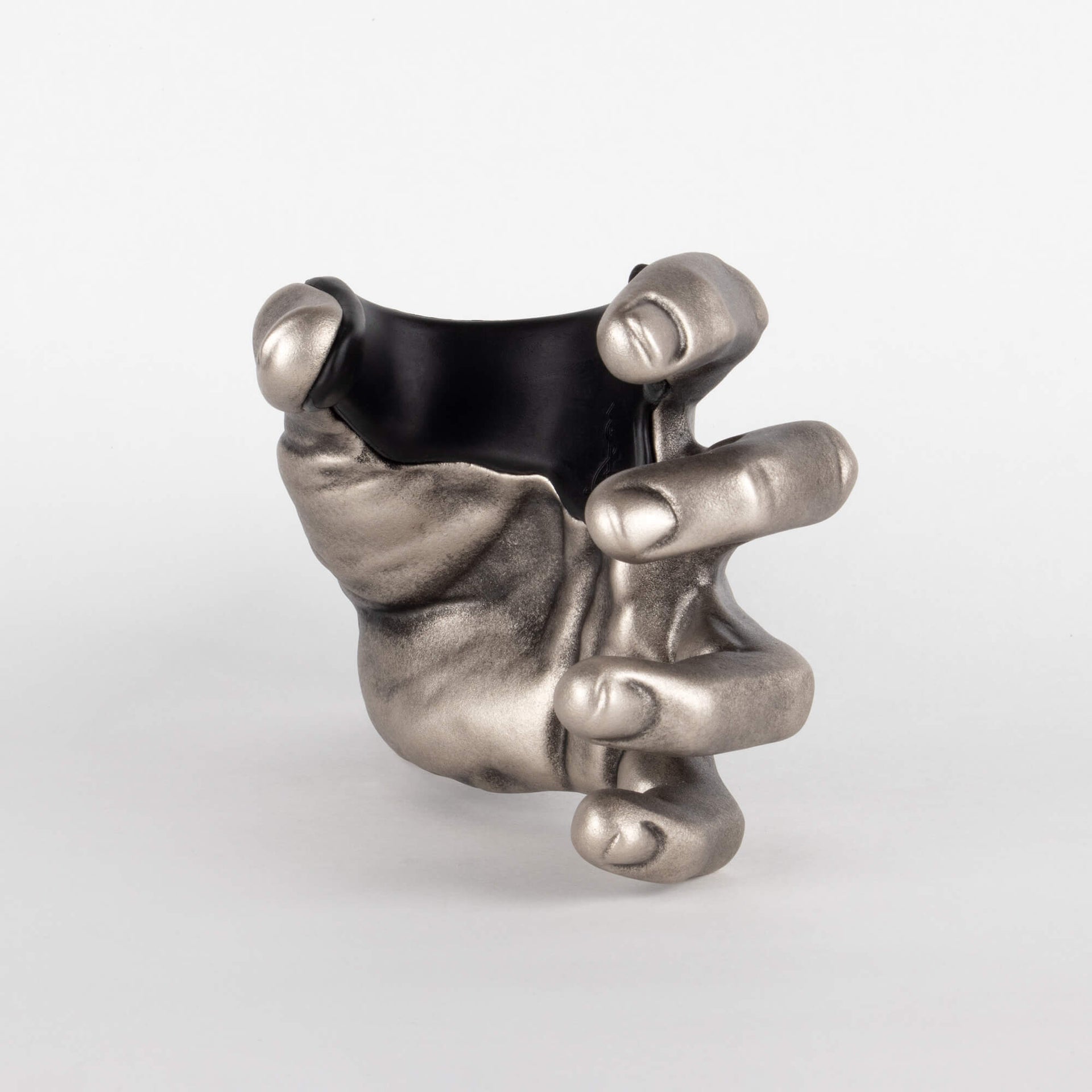 Hand shaped guitar hangers by GuitarGrip