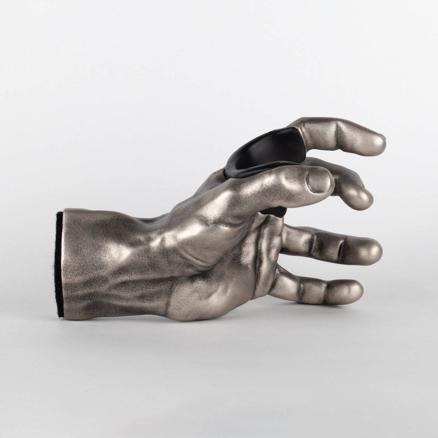 Hand shaped guitar hangers by GuitarGrip